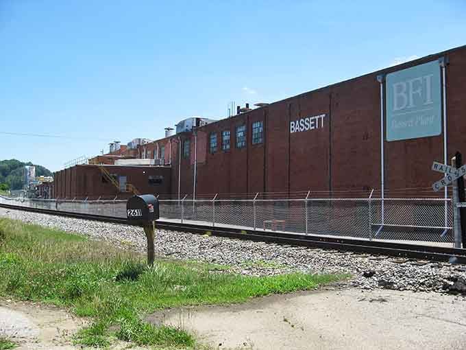 Old warehouses tell stories of manufacturing glory days, their weathered facades holding memories of workers who built this town's foundation.