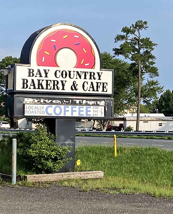 Even the roadside sign features a giant donut because subtlety has no place in serious bakery business.