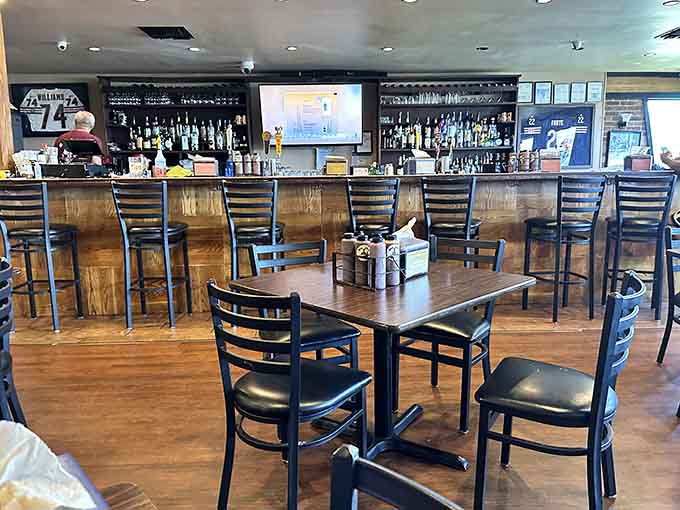 A well-stocked bar area where you can grab a cold one while waiting for your smoky feast.
