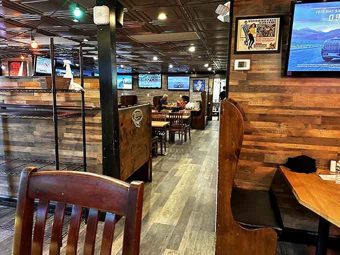 High-backed booths and warm lighting offer cozy corners for intimate meals or family celebrations together.