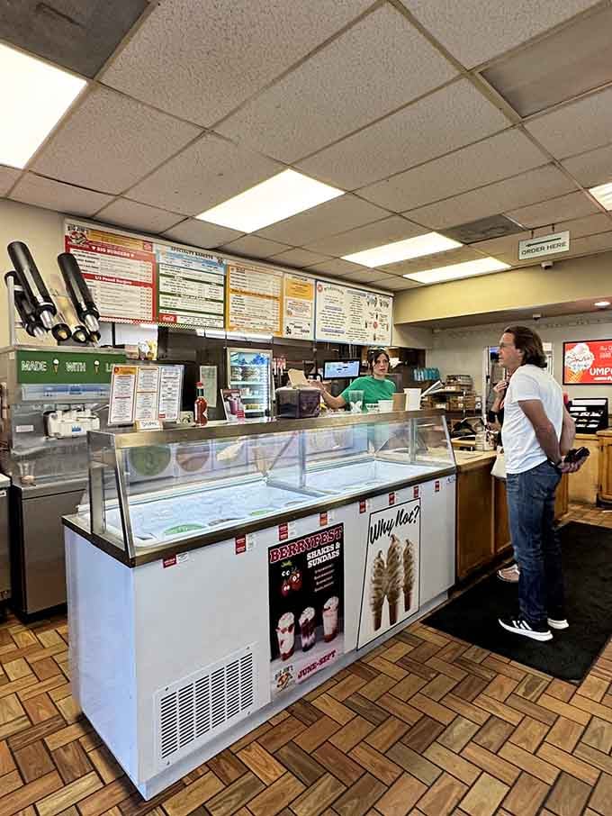 The order counter where dreams become reality and hunger meets its match in classic American efficiency.