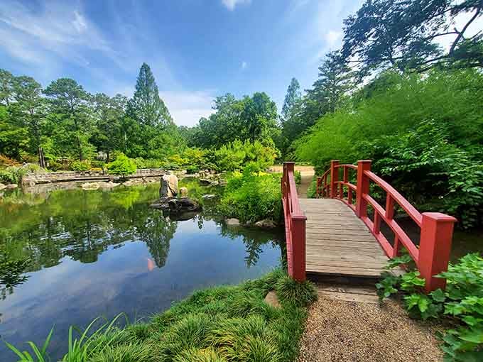 That crimson bridge over tranquil waters is basically begging you to pause and take seventeen contemplative photographs here.