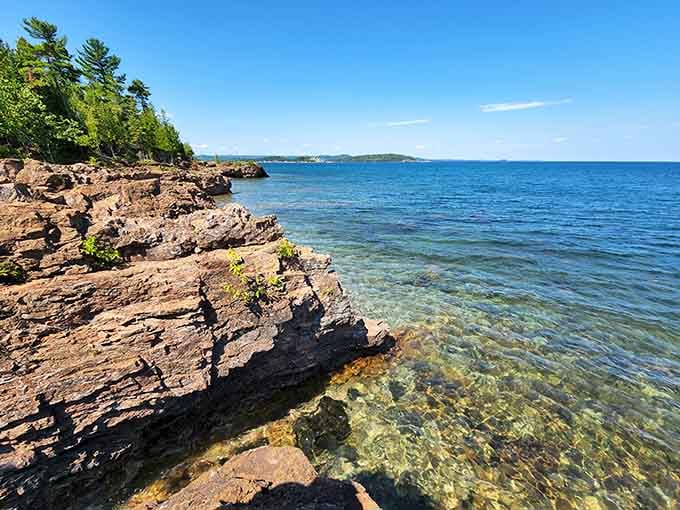 These towering rock walls frame the lake like nature's own picture window, no Instagram filter needed here.
