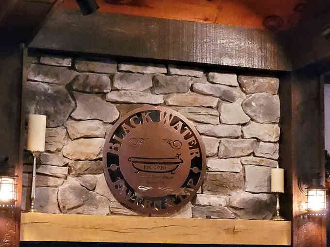 The stone fireplace backdrop adds warmth and character that makes every visit feel like coming home again.