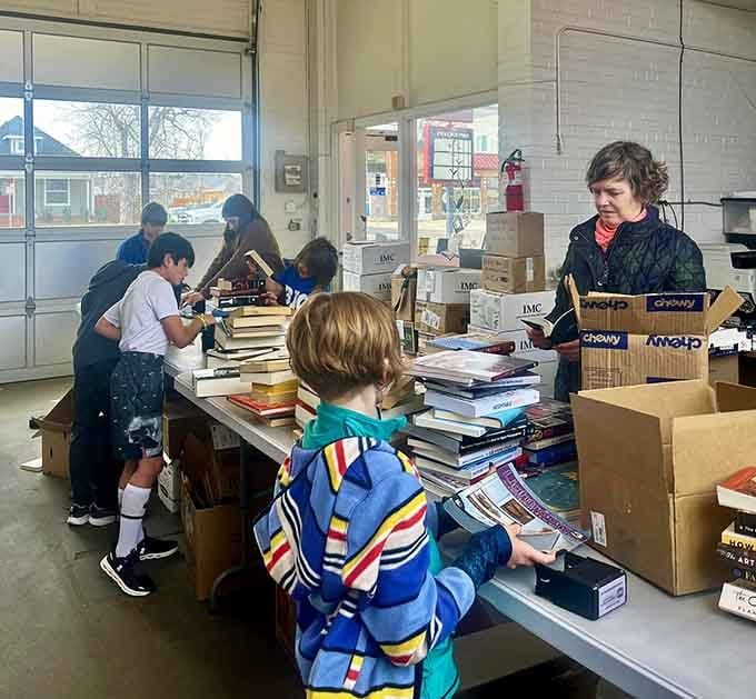 Families and book lovers browsing together, united by the universal language of free literature and good deals.