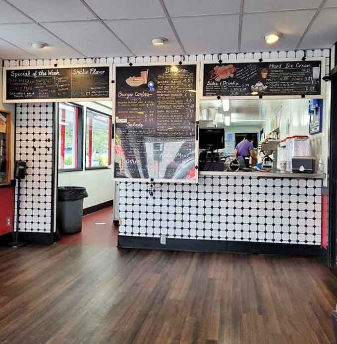 The order counter with its checkered tile and chalkboard menus: where decisions get made and cravings get satisfied.
