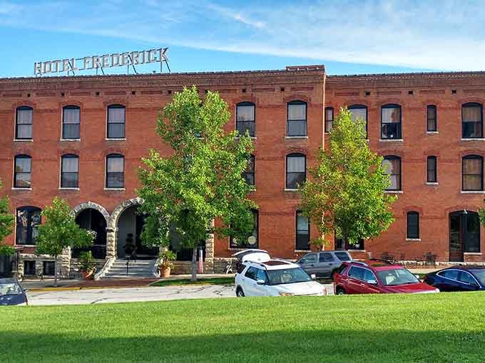 Hotel Frederick's imposing brick facade has welcomed travelers for generations, standing tall as Boonville's historic hospitality landmark.