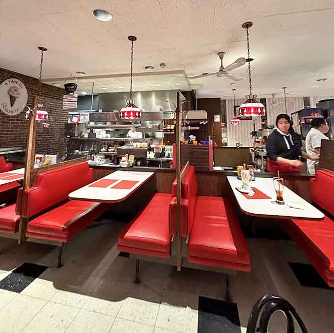 Those red vinyl booths have witnessed countless ice cream emergencies and family celebrations over the decades here.