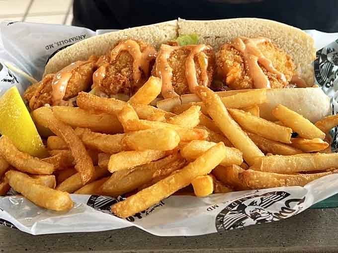 Fried shrimp po'boy loaded with golden crustaceans, offering crispy comfort when you need a break from steaming.