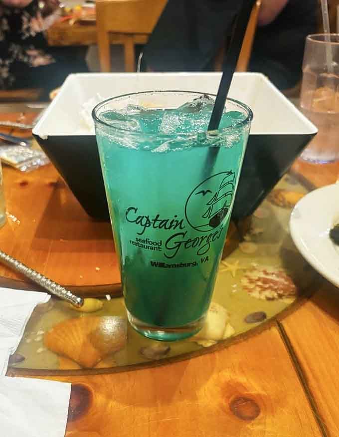 That electric blue beverage looks like it belongs in a tiki bar on a tropical island somewhere.