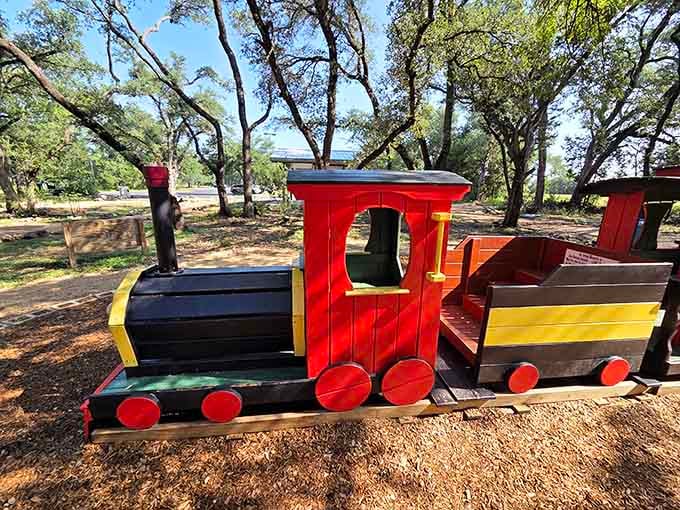 A wooden playscape proving that sometimes the best toys don't require batteries or Wi-Fi connections.
