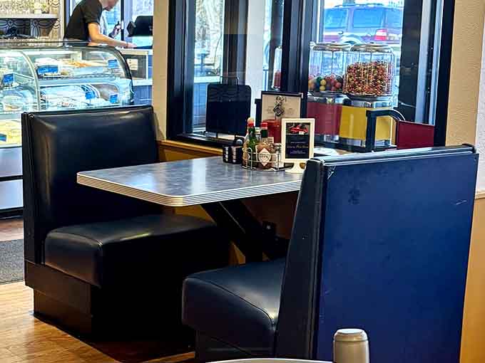 Classic diner booths meet Mediterranean warmth in a space that welcomes everyone from first dates to family reunions.