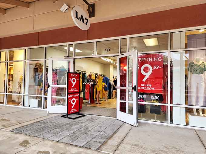 Storefronts lined up like soldiers of savings, each one promising deals that make you feel like a financial genius.