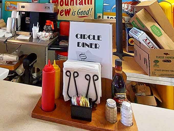Ketchup, mustard, and napkins ready for action because eating these burgers neatly is physically impossible and completely unnecessary anyway.