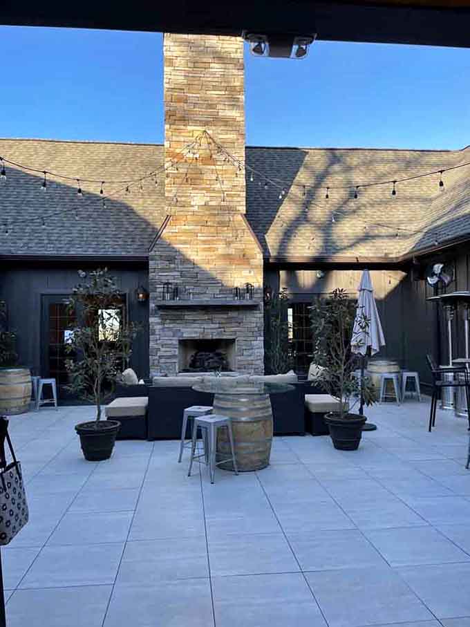 An outdoor fireplace for those evenings when you want your wine experience with a side of cozy ambiance.