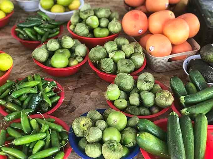 Fresh produce proving this market covers everything from vintage comics to tonight's dinner ingredients seamlessly.