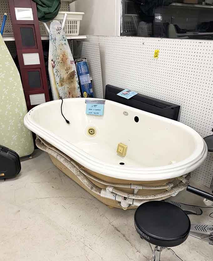 Yes, that's an actual bathtub on the sales floor, because sometimes thrift stores surprise you in wonderful ways.