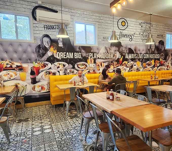 That wall mural celebrating Mexican breakfast culture sets the tone for everything delicious happening here.