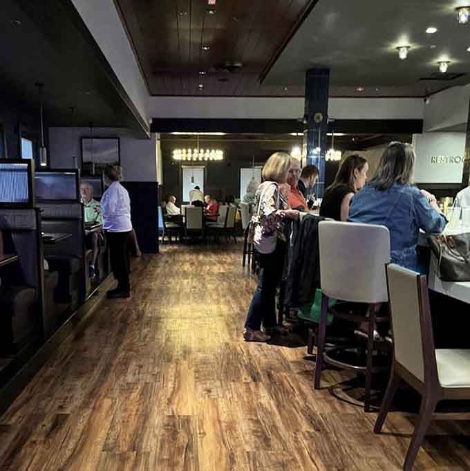 The dining room buzzes with happy conversations and the universal language of really good food being enjoyed.