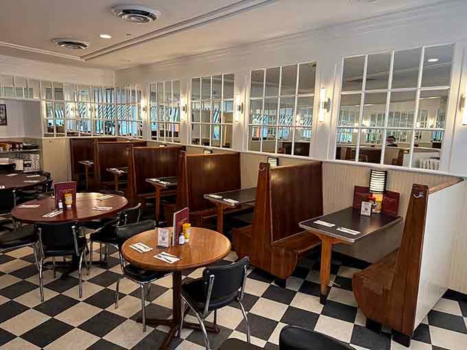 The dining room balances retro charm with modern comfort, creating space where memories are made over meals.