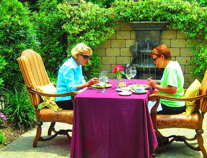 Dining al fresco in the garden transforms a simple meal into a memorable spa day experience.