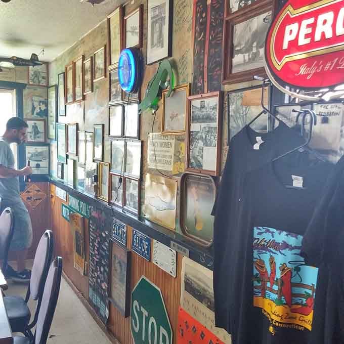 Vintage signs and local memorabilia create that authentic vibe no interior designer could ever successfully replicate or fake.