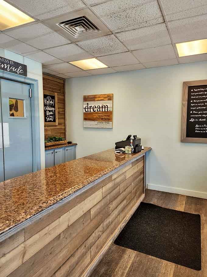 Simple counter, big dreams, and a sign reminding you that everything here is handmade with care.