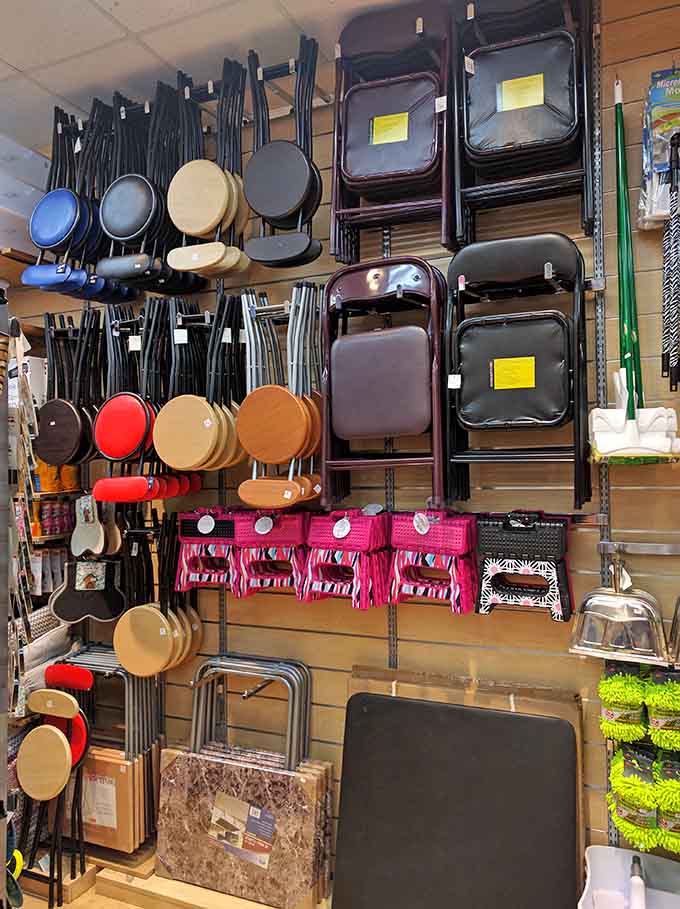 Folding chairs and stools displayed like modern art, ready to save your next gathering from awkward standing situations.