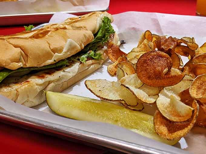 That Italian sub is stacked so high it requires engineering skills and possibly a jaw unhinging to eat.