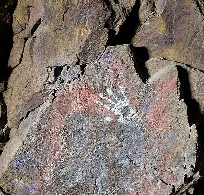 Someone's handprint on ancient stone reminds us we're all just passing through this remarkable place.
