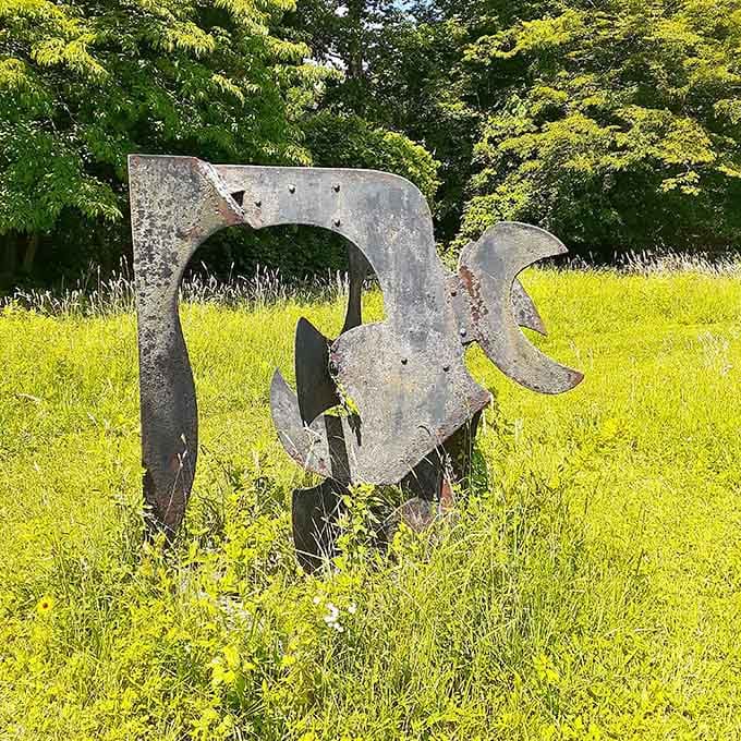 Take a deep breath and enjoy the wide, open views of the peaceful, green field, where art inspires quiet reflection.