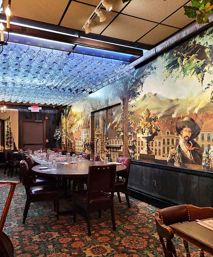 Murals of German countryside scenes cover the walls while that stein chandelier steals the show from above.