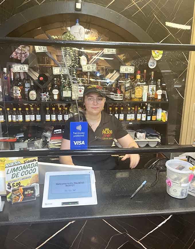 Friendly face behind the counter keeps everything running smoothly while you focus on eating.