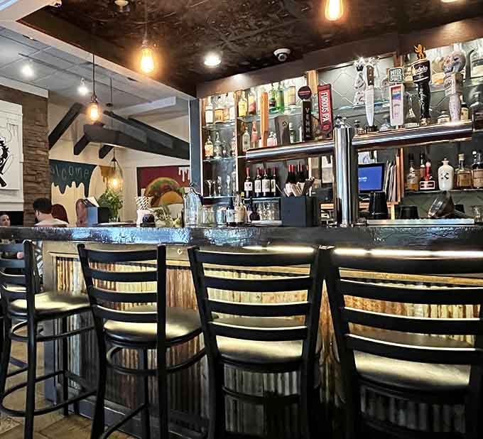 A well-stocked bar promising expertly crafted cocktails that'll make you forget all about whatever you were drinking before.