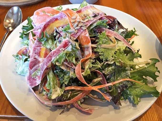 Fresh greens dressed simply because when ingredients are this good, less really is more here.