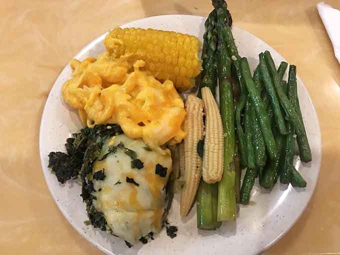 Asparagus standing at attention next to comfort food, creating the kind of balanced plate nutritionists dream about seeing.