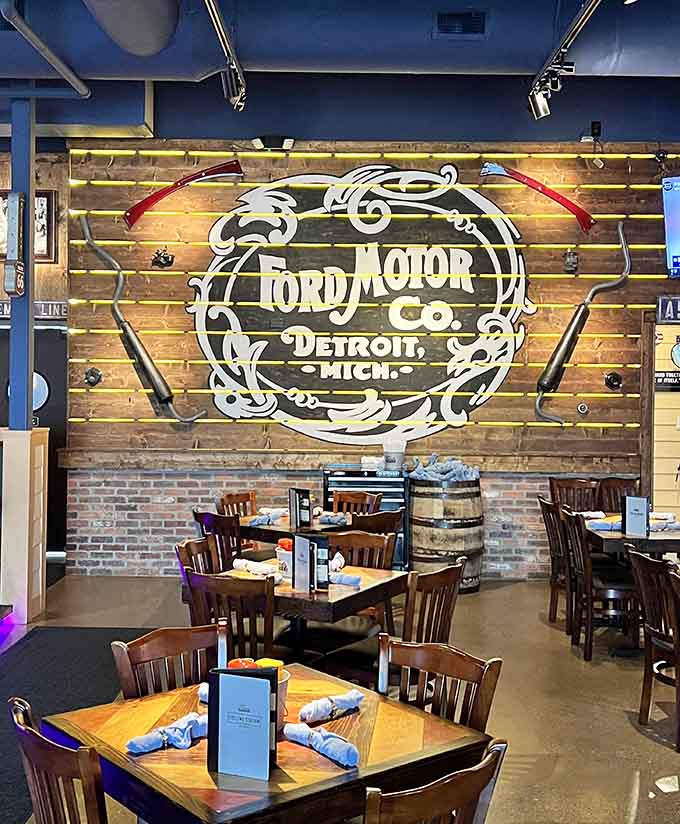 Booth seating with Ford Motor Company branding overhead makes every meal feel like a historic automotive celebration.