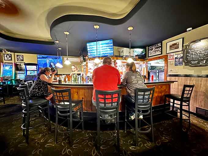 The bar where locals gather, stories flow, and everyone knows ordering a massive burger is always right.
