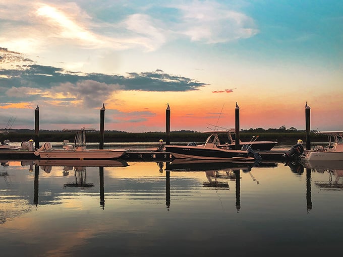 The marina at sunset turns every boat into a silhouette worthy of framing, or at least your phone's wallpaper.