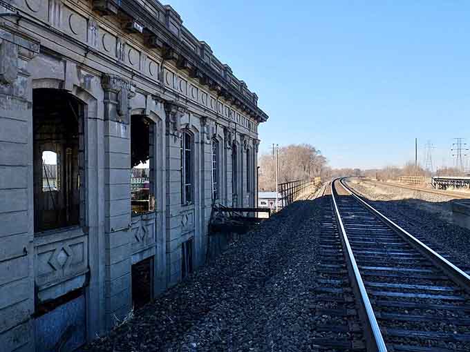 Trains still rumble past this forgotten beauty, a daily reminder of what once was and might be.