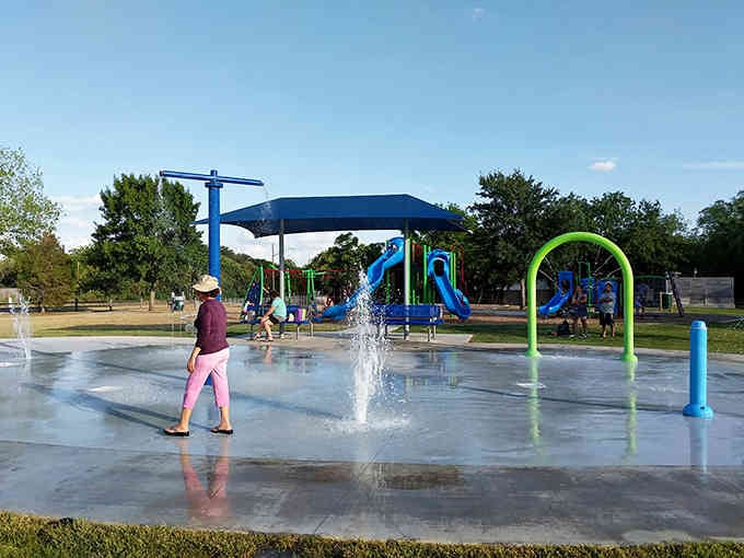 Splash pads are basically air conditioning you can run through, and in Texas summer, that's not just fun, it's survival strategy.