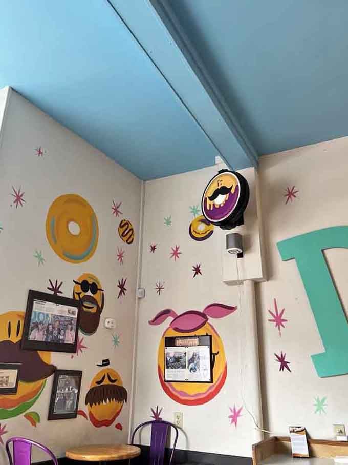 Those playful donut characters on the wall have more personality than most people you'll meet at the DMV.