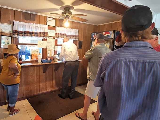 Locals who know that the best meals come from places where everyone eats together, regardless of what they drove there.