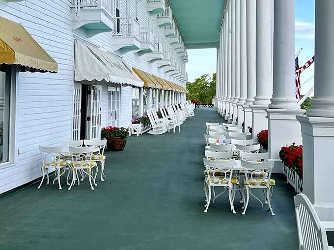 The world's longest porch stretches into the distance, lined with rocking chairs that have cradled generations of contented guests.
