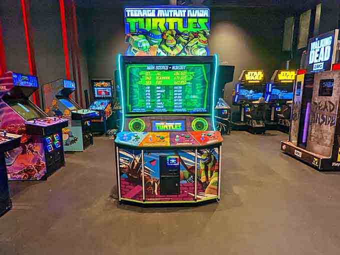 The Turtles arcade game stands ready for action, because some heroes really do live in a half-shell and full-sized cabinet.
