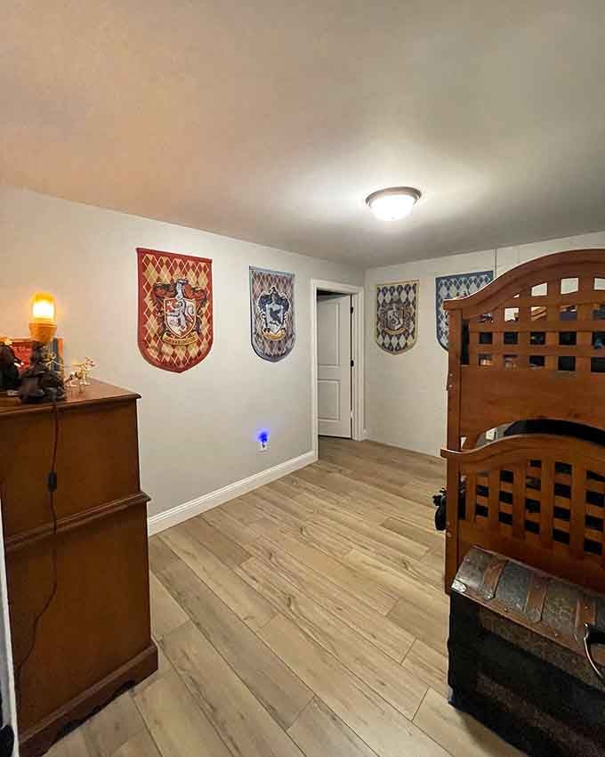 House banners line the walls of this bedroom, making it impossible to forget you're in wizarding territory.