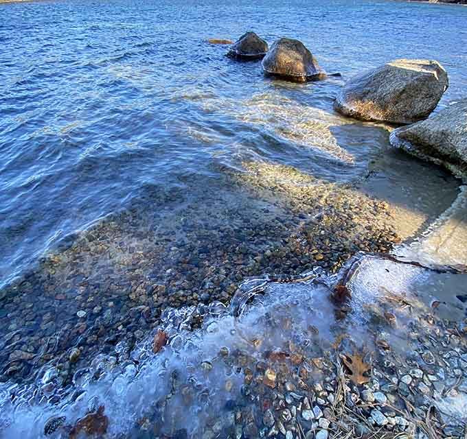 Crystal-clear shallows reveal every pebble below, perfect for people who like knowing what they're stepping on.