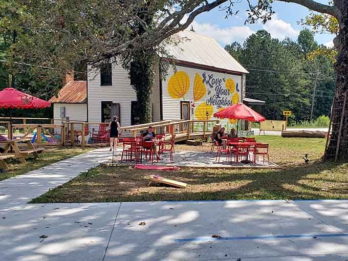 Yellow tables inside create sunny spots for lingering over coffee and catching up with actual human beings.
