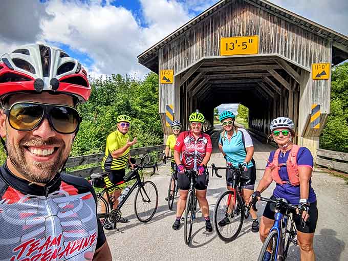 Even cyclists know a photo op this good requires a mandatory stop, helmets and all.