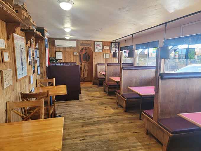 Cozy booth seating and simple wooden tables let you focus on what matters: the incredible food coming your way.
